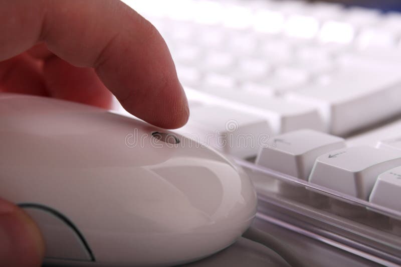 Hand over computer mouse. stock photo. Image of click - 8664592