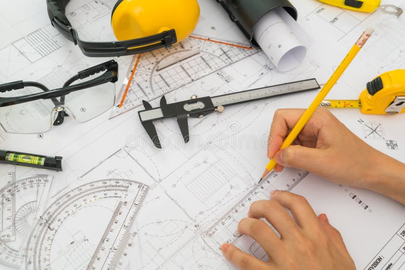 Hand Over Construction Plans with Yellow Helmet and Drawing Tool Stock ...