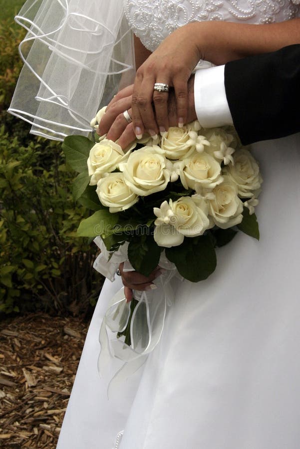 Hand over hand stock photo. Image of veil, commit, roses - 1109624
