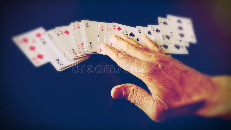 Hand over playing cards stock photo. Image of spreading - 83258644