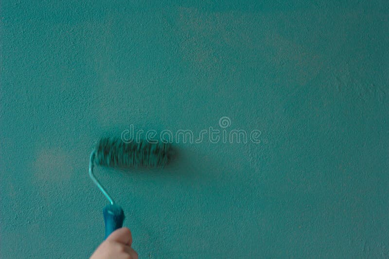 Hand with Paint Roller Over the Green Wall. Stock Image - Image of hand ...