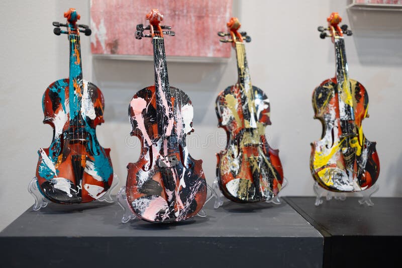 Hand-Painted Colorful Violins in a Modern Art Installation Editorial ...