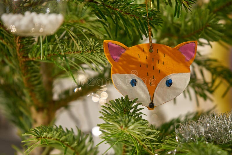 Hand Painted Wooden Fox Hanging in a Christmas Tree Stock Image - Image ...