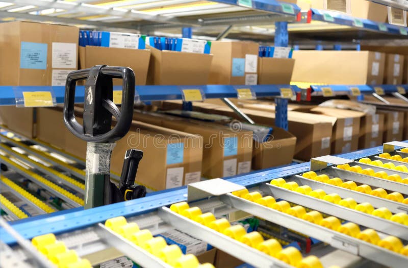 Hand Pallet Truck in a Warehouse Stock Photo - Image of factory, pallet ...