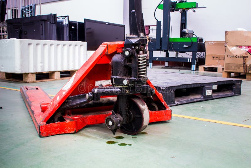 The Hand Pallet Truck in a Warehouse Editorial Stock Photo - Image of ...