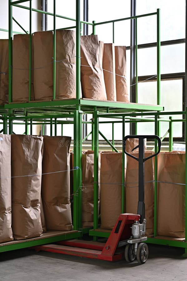 The Hand Pallet Truck in a Warehouse Stock Image - Image of store ...