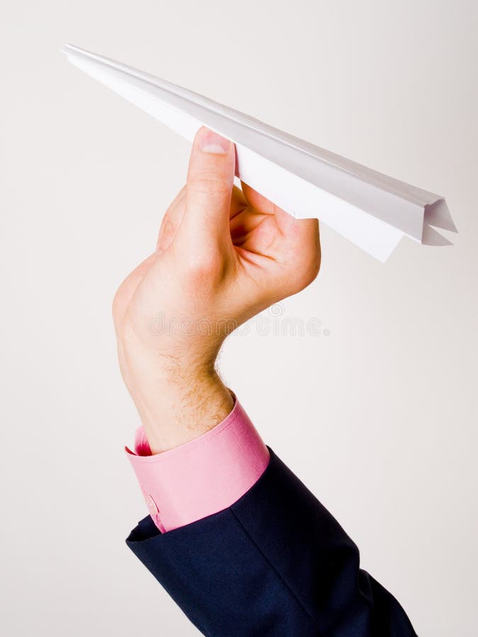 Hand with paper airplane stock image. Image of folded - 8925317