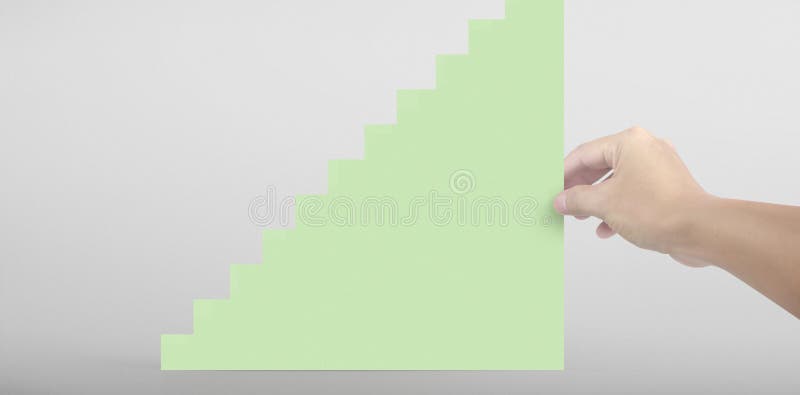 Hand and Paper Cut Out Figure on Increasing Arranged Blocks Stock Image ...