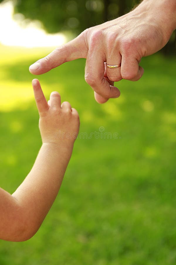 Hand of Parent and Child in Nature Stock Image - Image of hand, mother ...