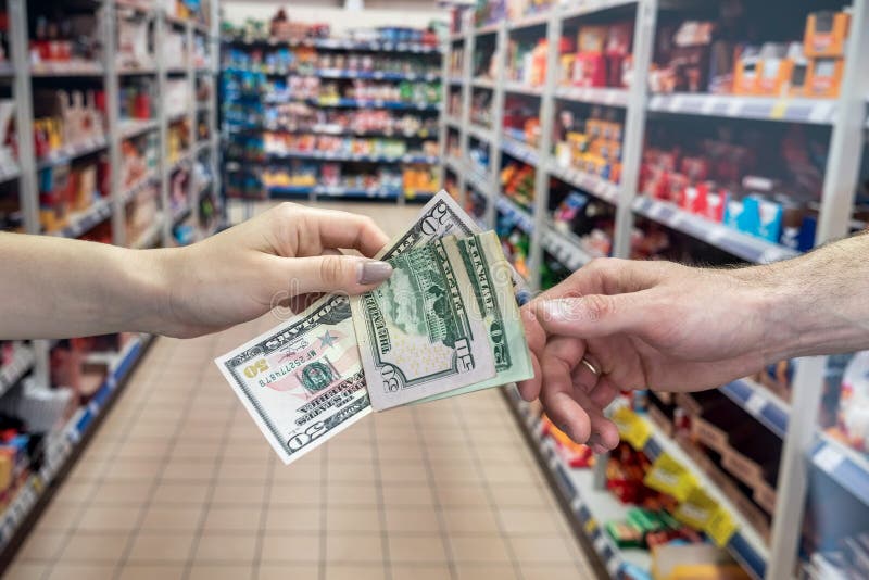 Hand Passing Money in Supermarket Stock Photo - Image of fruit ...