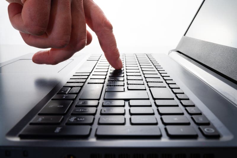 Hand on PC keyboard. stock photo. Image of electronics - 320816474
