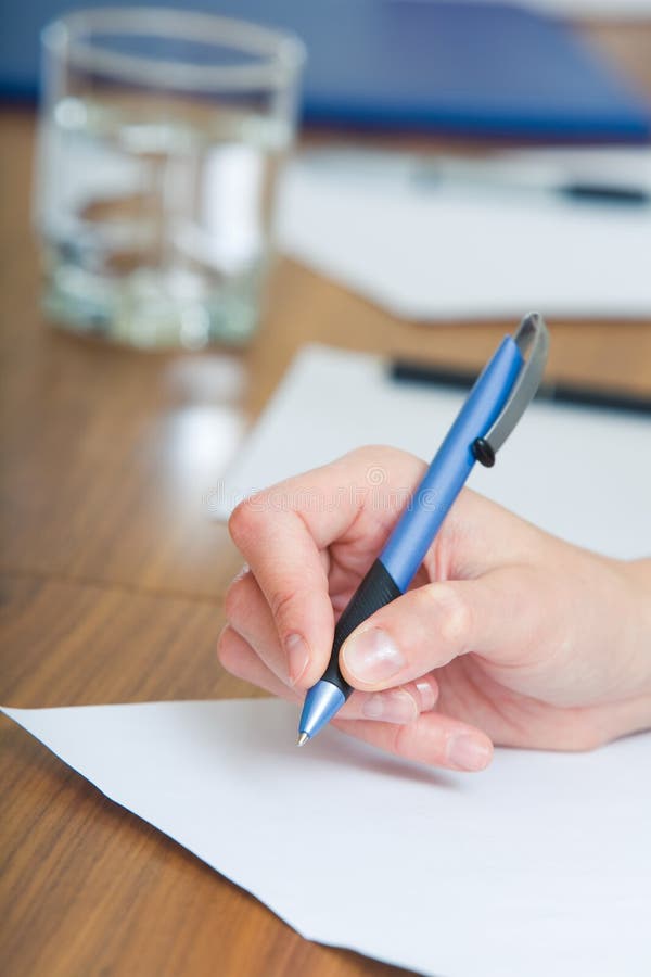 Pen in hand stock photo. Image of female, desktop, corporate - 4338760