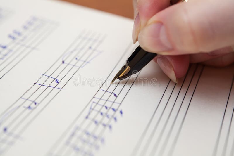 Hand with Pen and Music Sheet Stock Image - Image of inspiration ...