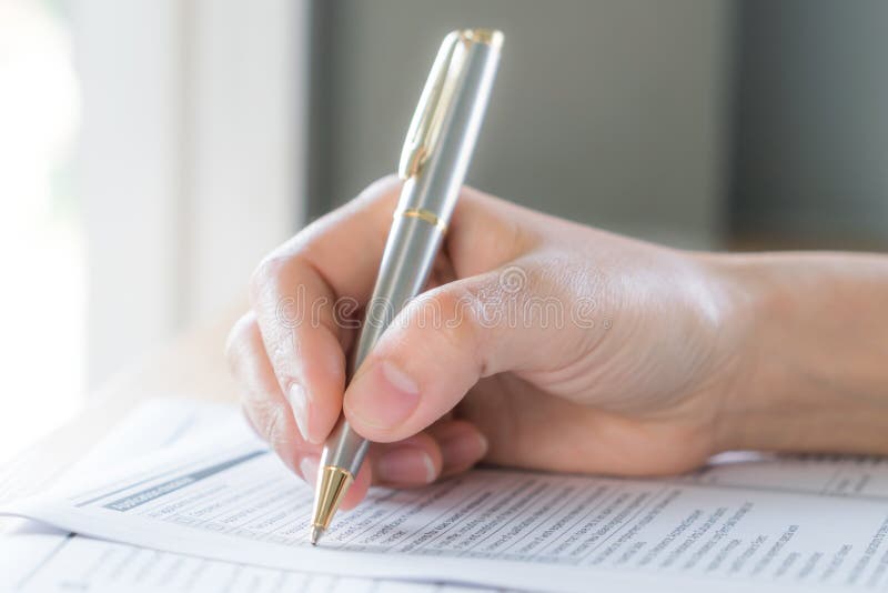 .Hand with Pen Over Application Form Stock Photo - Image of test ...