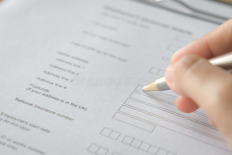 .Hand with Pen Over Application Form Stock Image - Image of text ...