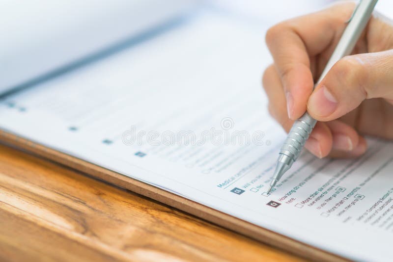 Hand with Pen Over Application Form . Stock Photo - Image of laptop ...