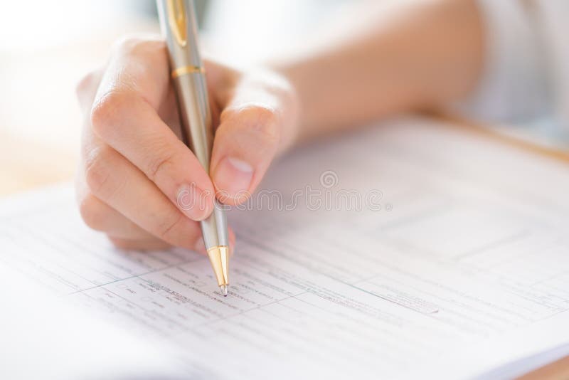 Hand with Pen Over Application Form Stock Photo - Image of business ...