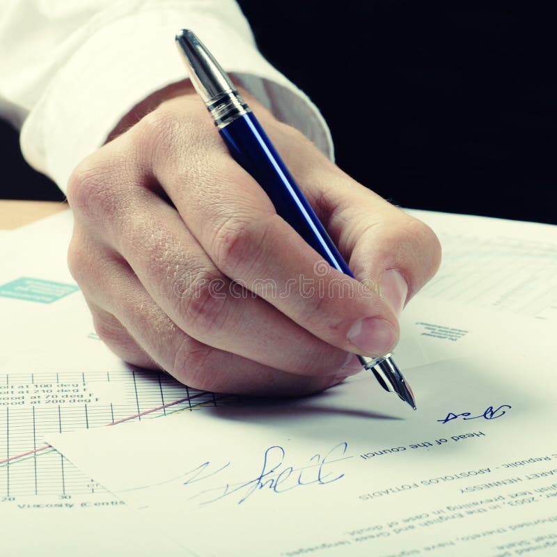Hand with Pen Signing a Document Stock Image - Image of businessman ...