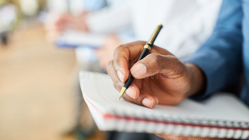 Hand with Pen while Writing a Checklist Stock Photo - Image of notes ...