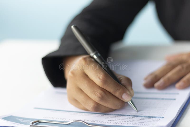 Hand and Pen Writing Insurance Forms Stock Image - Image of hand, close ...