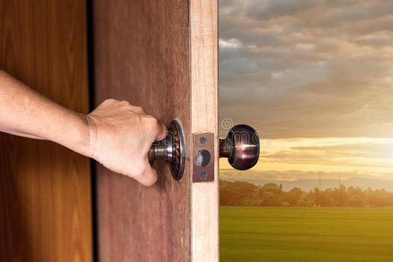 Hand of People Open the Door To Inside ,outside Door Open Putting into ...