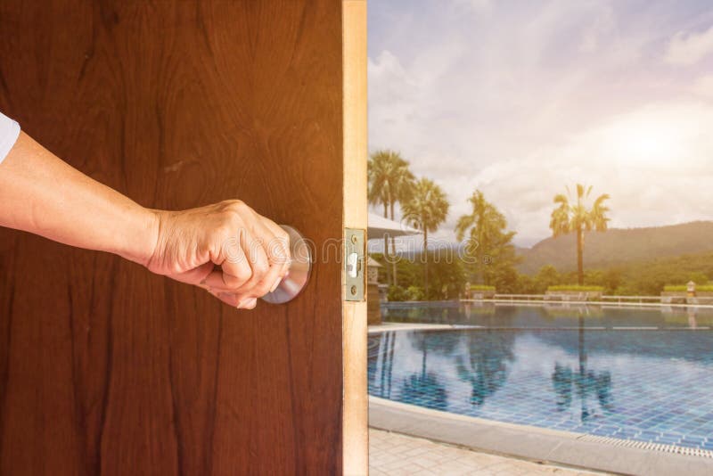 Hand of People Open the Door To Inside ,outside Door Open Putting into ...