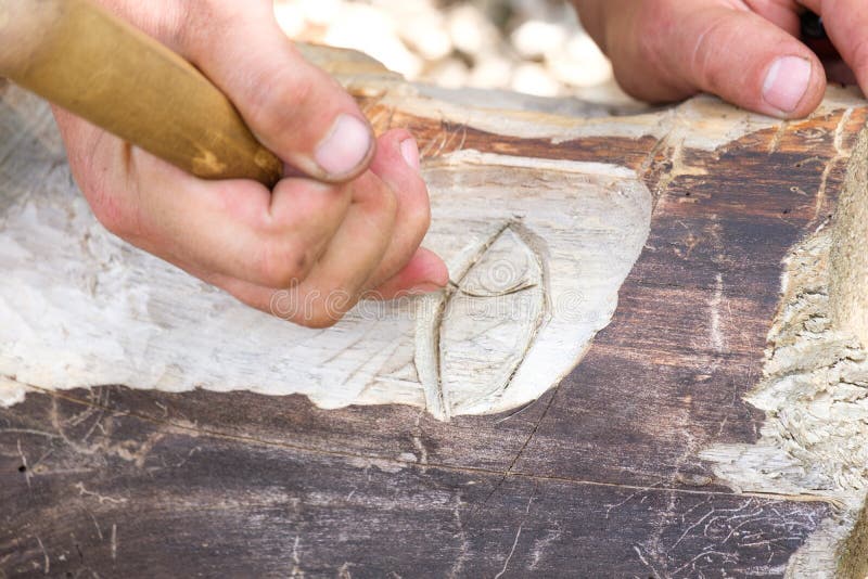 The Hand Performs Wood Carving with a Tool Stock Image - Image of ...