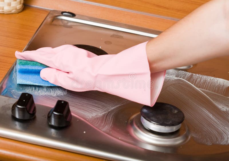 Hand of the Person Cleans a Cooker Stock Photo - Image of glove, hand ...
