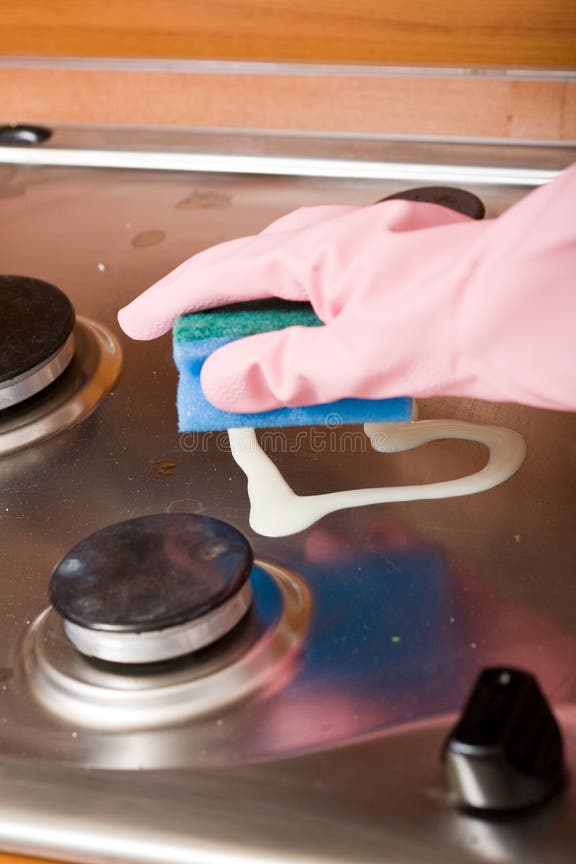 Hand of the Person Cleans a Cooker Stock Image - Image of goods ...