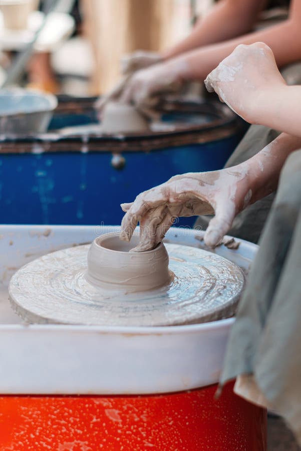 The Hand of a Person Creates a Clay Figure in Pottery Stock Image ...