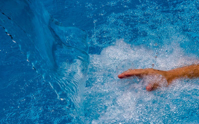 Hand of a Person in the Crystal Blue Water of a Pool Stock Photo ...