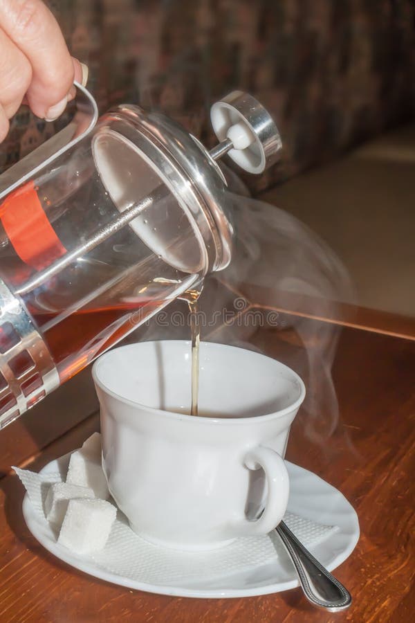 Hand of the Person Giving Some Tea in a Mug Stock Photo - Image of ...