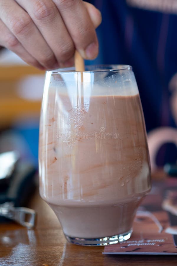 Hand of a Person Mixing Morning Coffee Mocha Stock Photo - Image of ...