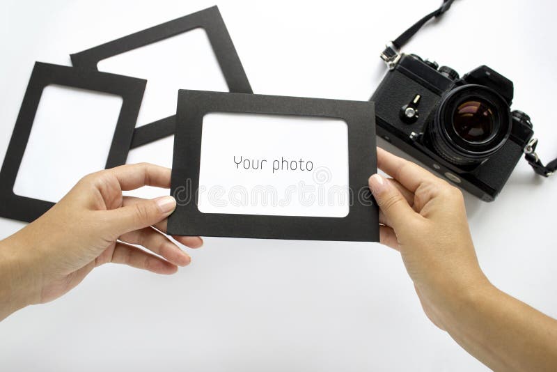 Hand with Photo Frame on Camera Background Stock Photo - Image of ...