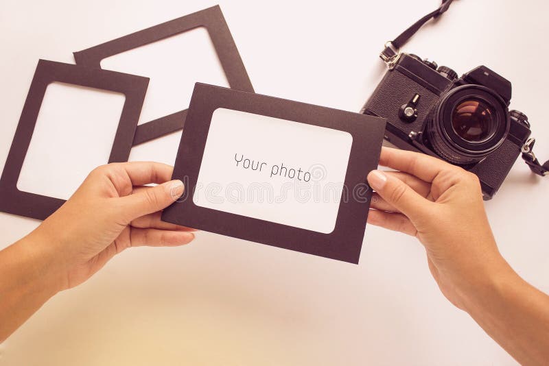 Hand with Photo Frame on Camera Background Stock Image - Image of ...