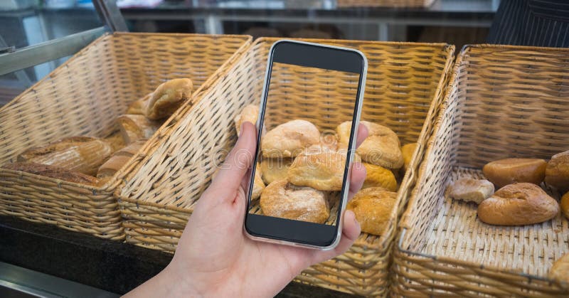 Hand Photographing Muffins through Smart Phone at Bakery Stock Image ...