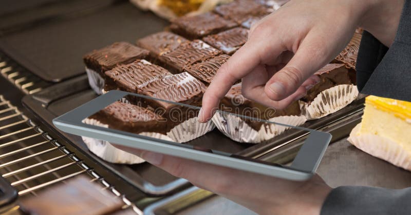 Hand Photographing Muffins through Smart Phone at Bakery Stock Image ...