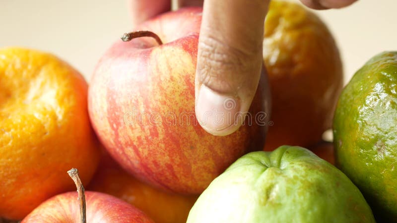 Hand Pick a Apple Fruit from Mixed Fruit Bowl Stock Video - Video of ...