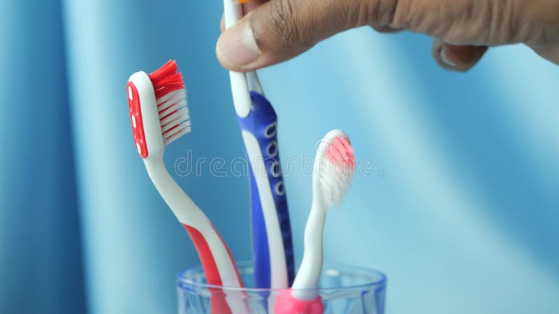 Hand Pick a Colorful Toothbrushes Stock Footage - Video of pick ...