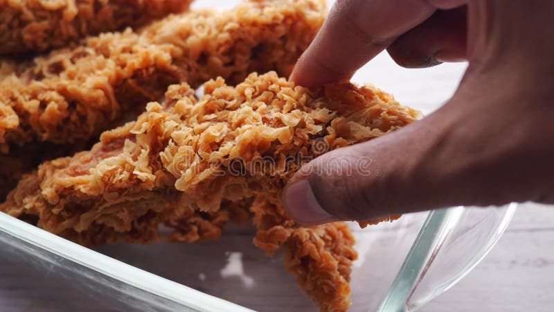 Hand Pick a Fried Chicken Fillets on Plate Stock Video - Video of ...