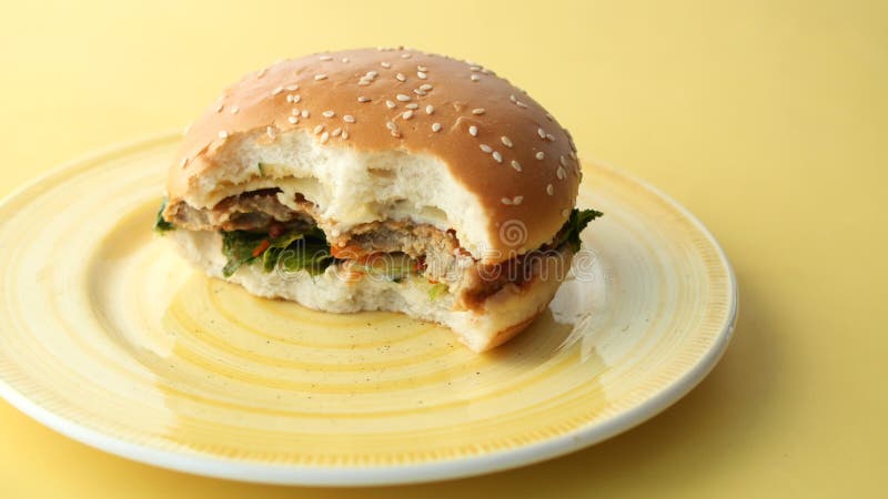 Half Eaten Beef Burger on Table Close Up Stock Video - Video of plate ...
