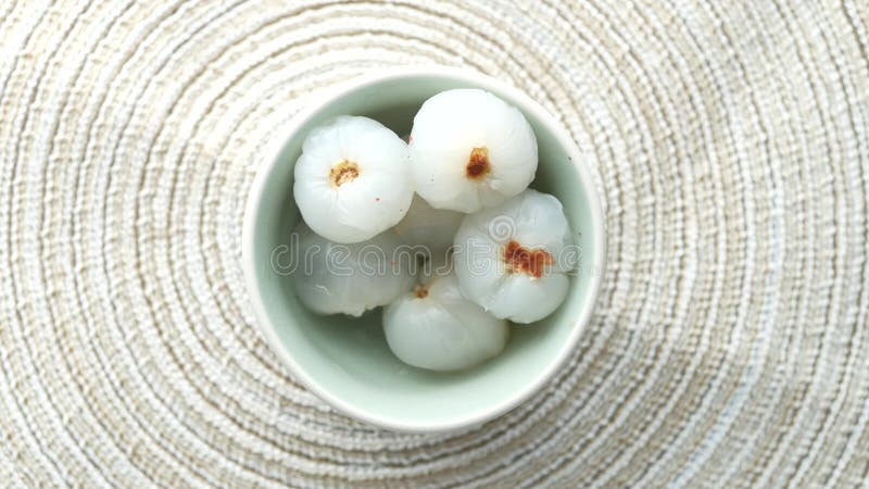 Hand Pick a Lychee from a Bowl on Table Stock Video - Video of ...