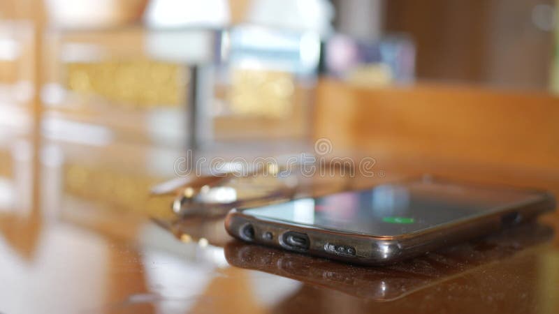 Hand Pick a Smartphone from a Table Stock Footage - Video of smartphone ...