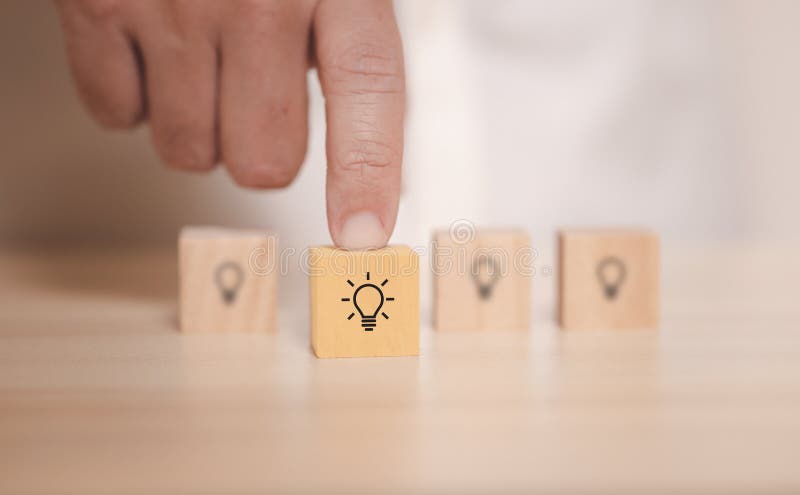 Hand Pick Wooden Blocks with Thinking and Idea Icon. Stock Photo ...
