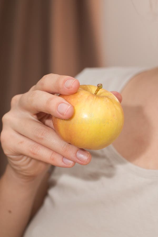 Hand Picking a Fresh Apple. Female Hand Holding Fresh Ripe Apple Stock ...