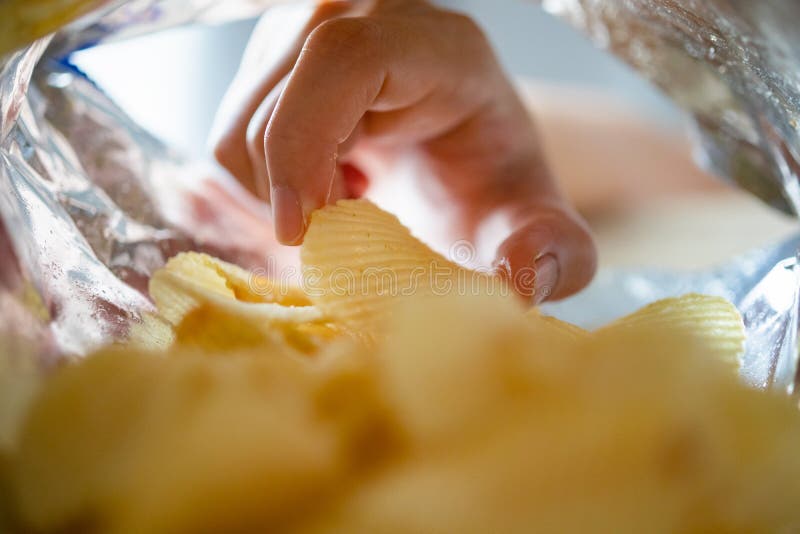 Hand Picking Potato Chips Inside Snack Bag Stock Image - Image of food ...