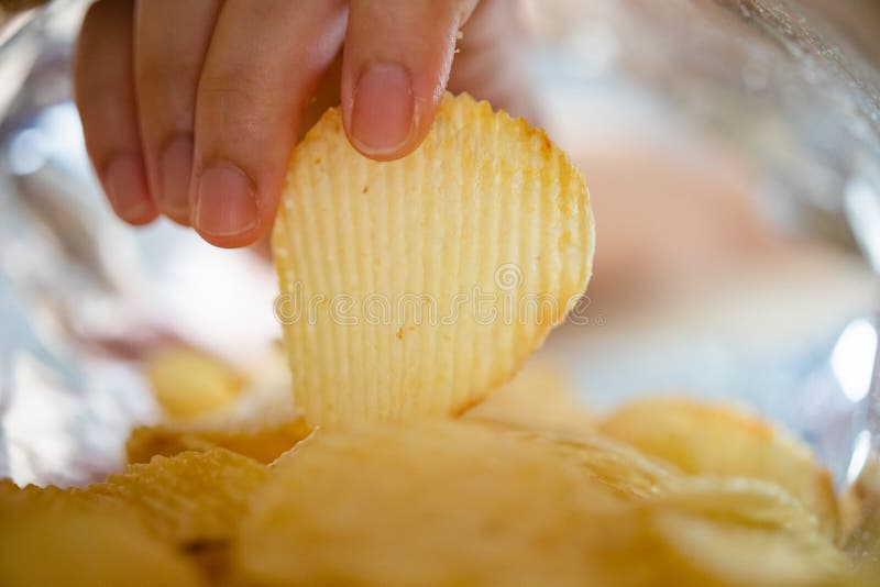 Hand Picking Potato Chips Inside Snack Bag Stock Image - Image of junk ...