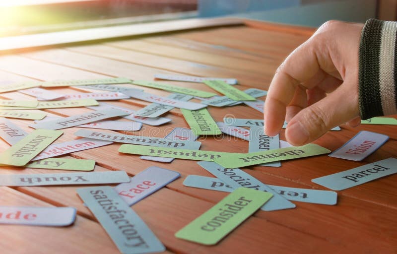 Hand Picking Up Cards in Class Stock Image - Image of class, poster ...