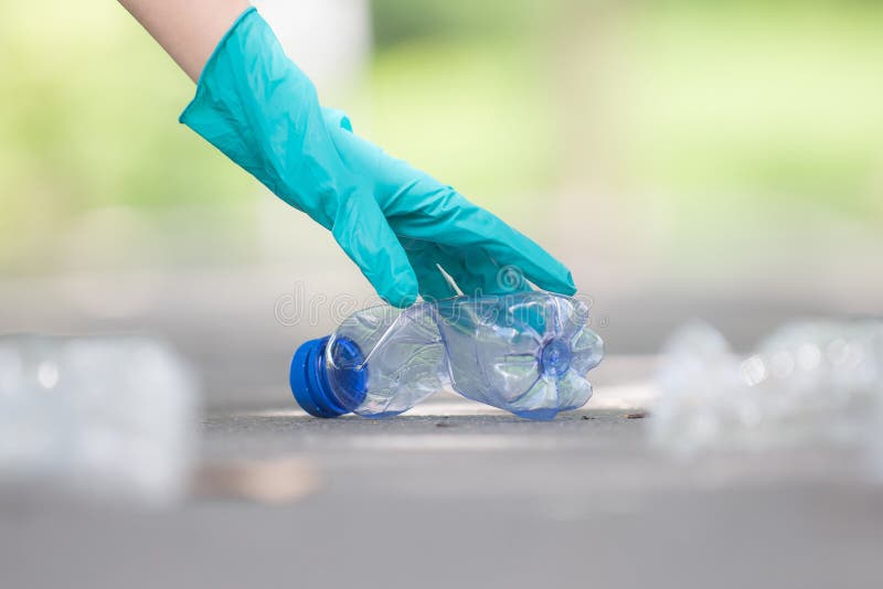 Hand Picking Up Garbage Plastic Stock Image - Image of female ...