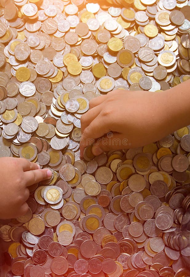The Hand that is Picking Up Many Coin. Stock Photo - Image of bank ...